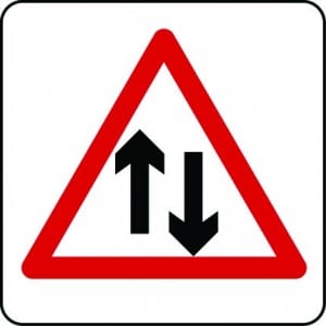 Traffic -Two way traffic (vertical arrows) sign - Stocksigns